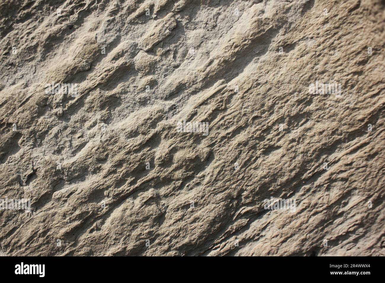 A worn and weathered natural stone wall with lots of texture Stock ...