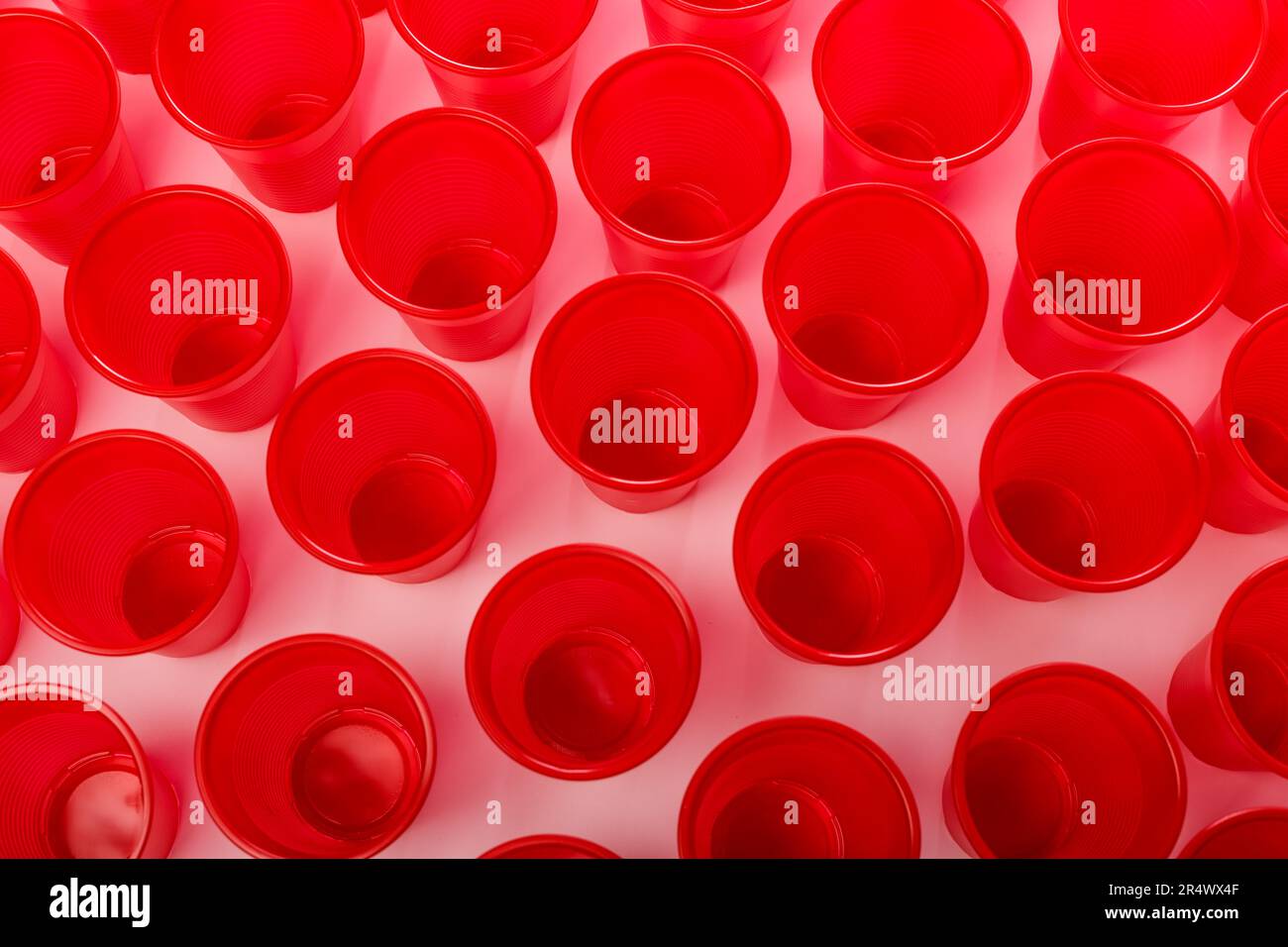 red disposable plastic glasses Stock Photo - Alamy