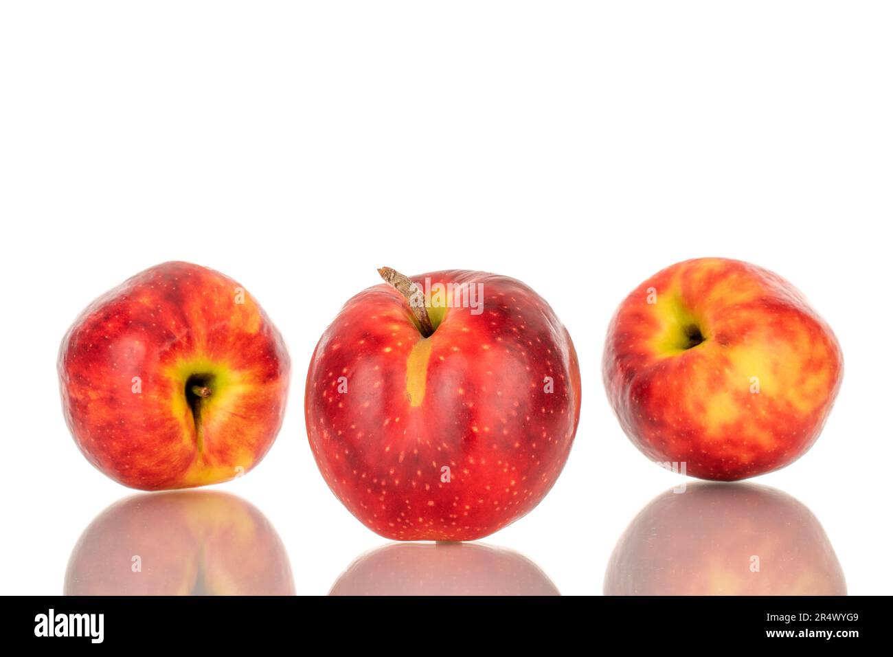 Three red apples, macro, isolated on white background Stock Photo - Alamy