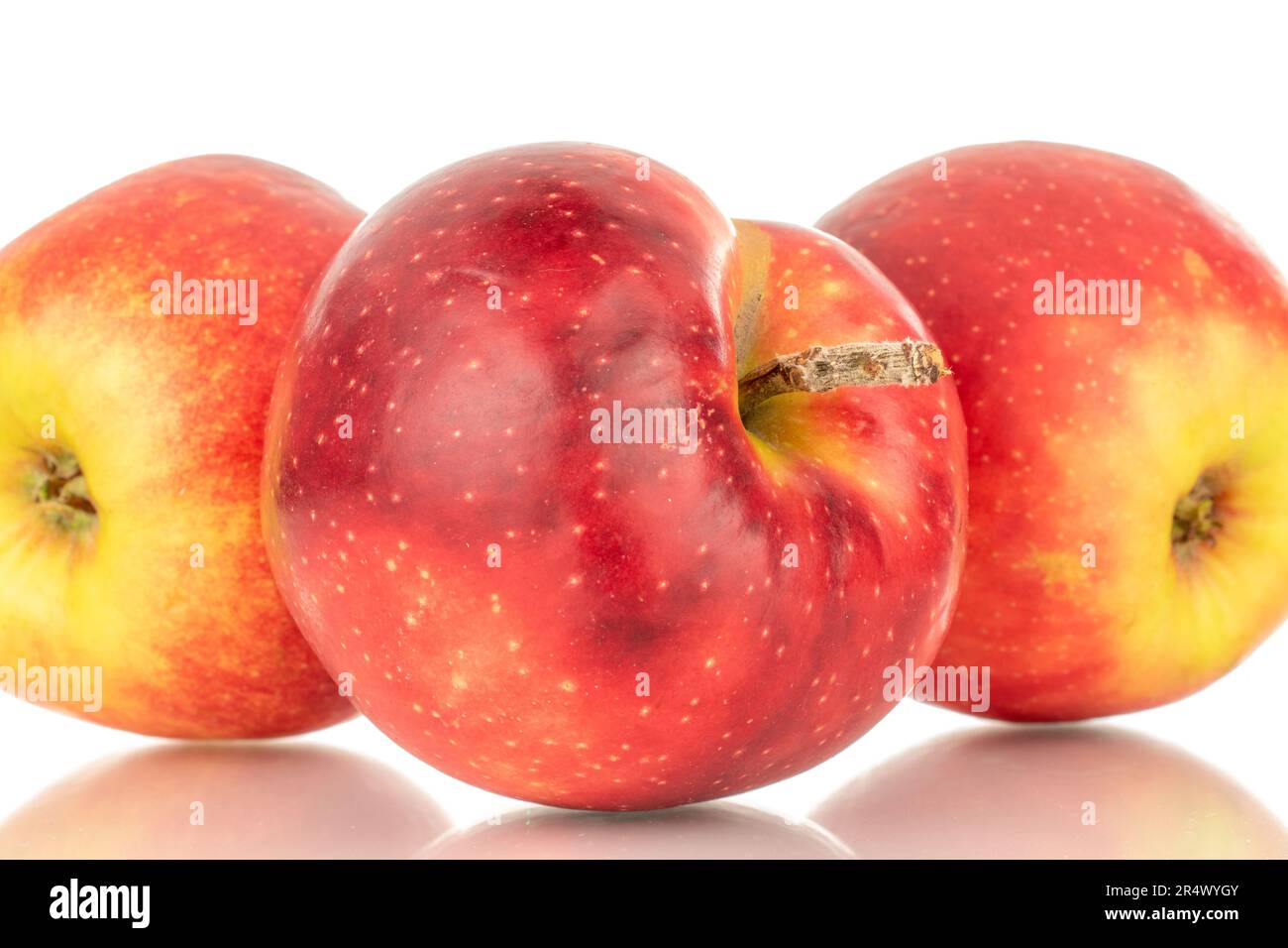Three red apples, macro, isolated on white background Stock Photo - Alamy