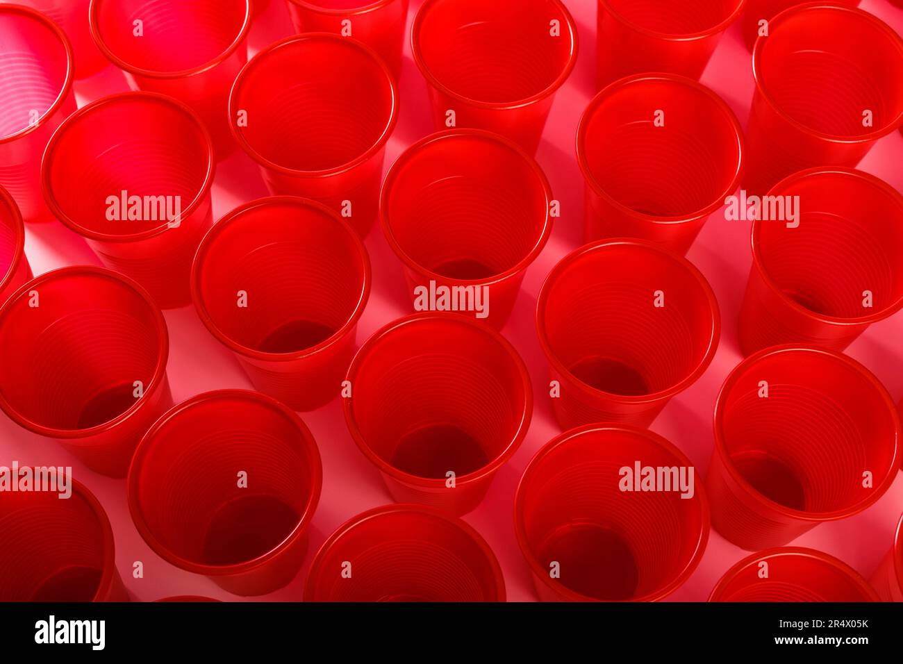 red disposable plastic glasses Stock Photo - Alamy