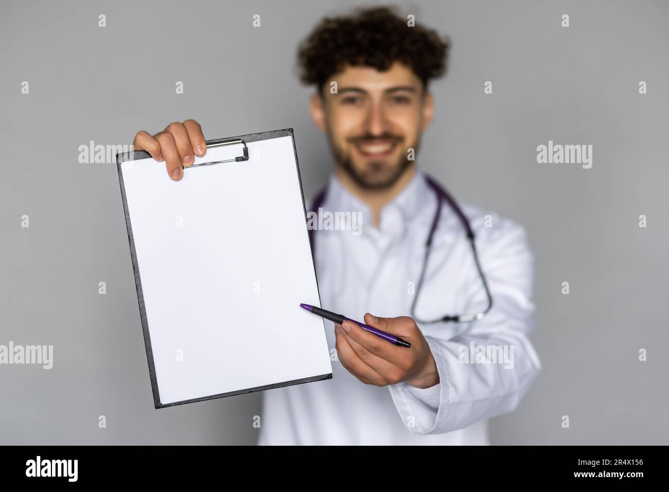 Portrait of doc showing blank empty copy space paper document contract ...