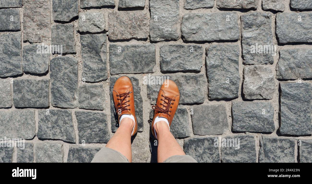 Cobblestone street travel man shoes selfie foot walking pavement stone ...