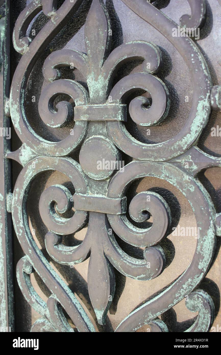 Decorative copper metal gate with lots of swirls Stock Photo - Alamy