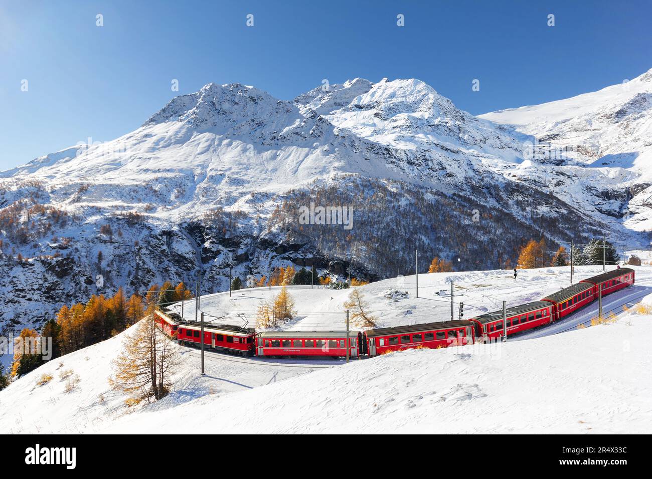 Alp Grum, Switzerland - November 05. 2021 : Red train from Rhaetian ...