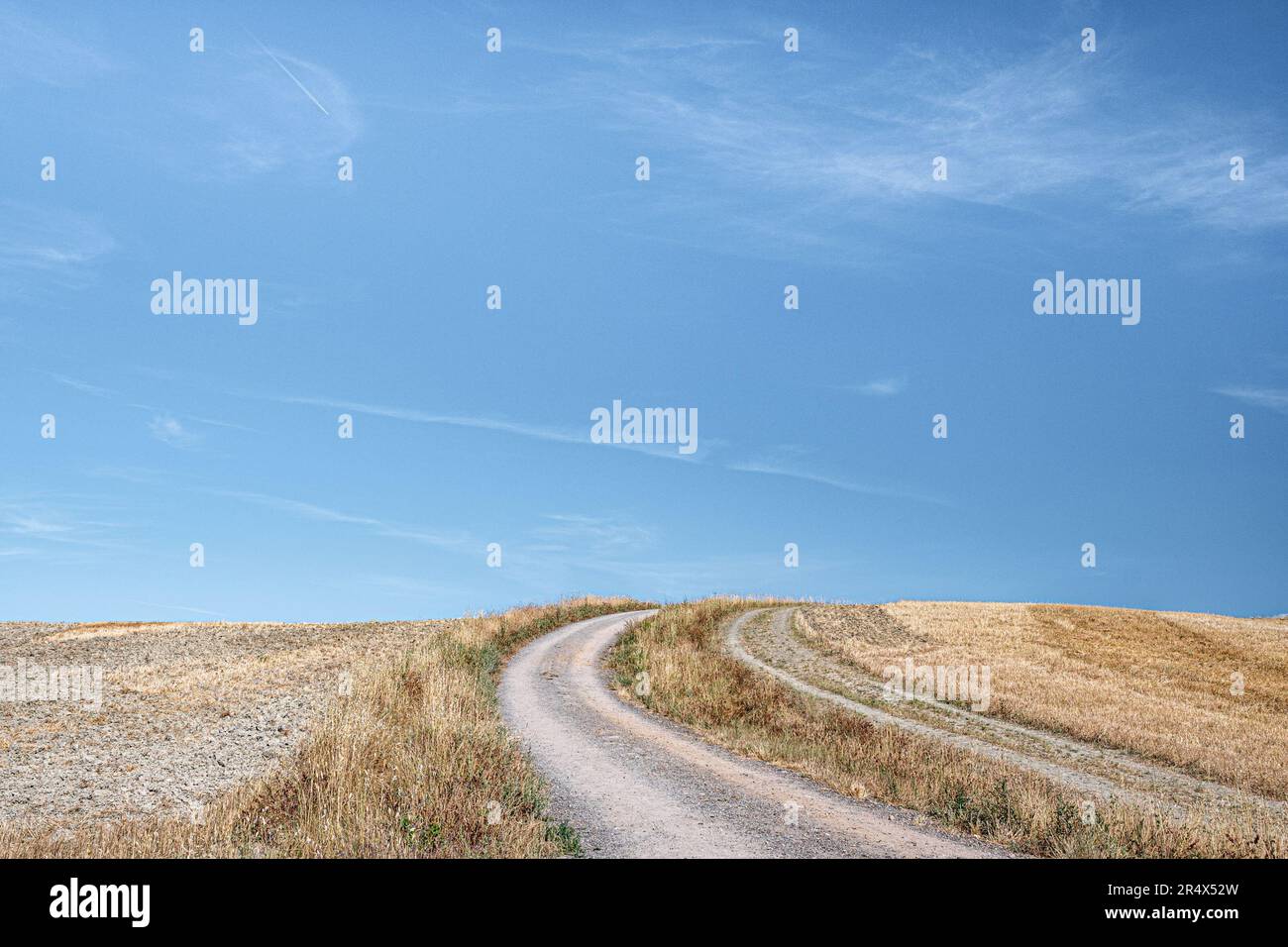 Countryside landscape with road through fields Stock Photo - Alamy Countryside landscape with road through fields Stock Photo - Alamy
