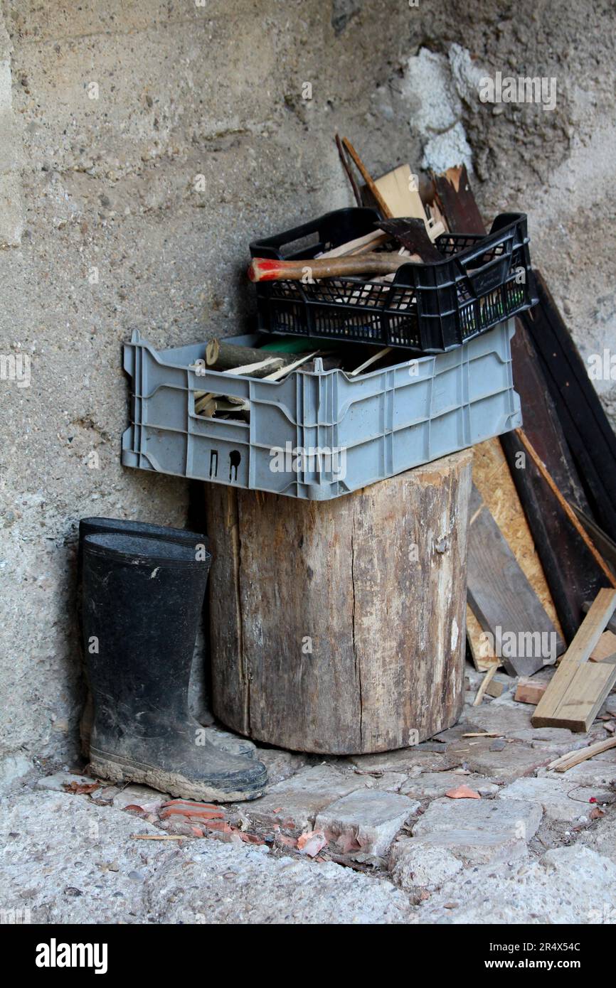 Used grey and black plastic crates with perforated base and sides made ...