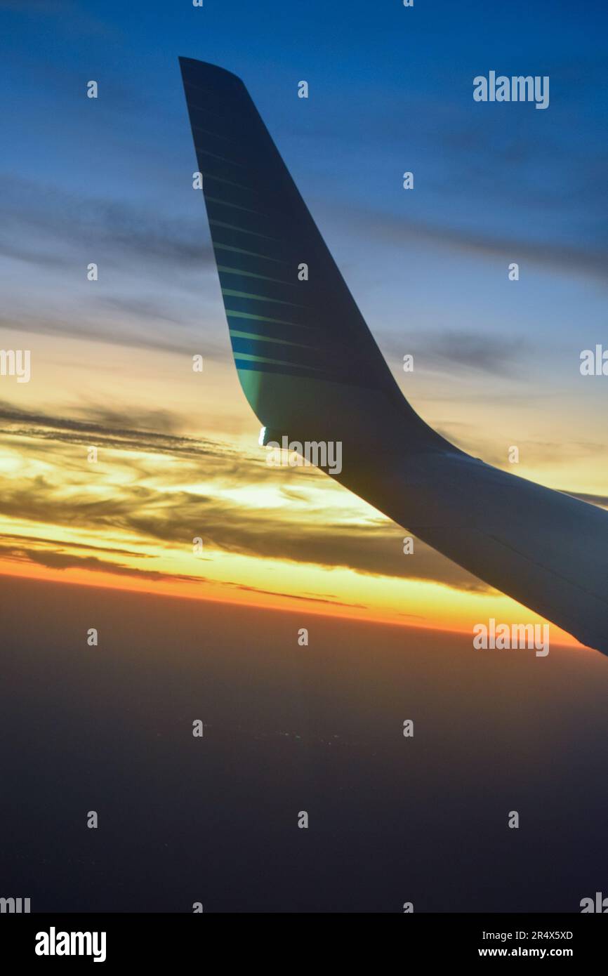 Sunset from the sky. View from the airplane window Stock Photo - Alamy