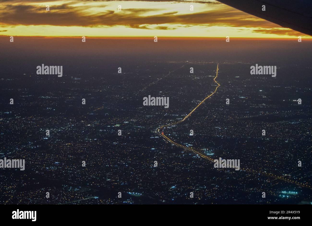 Sunset from the sky. View from the airplane window Stock Photo - Alamy