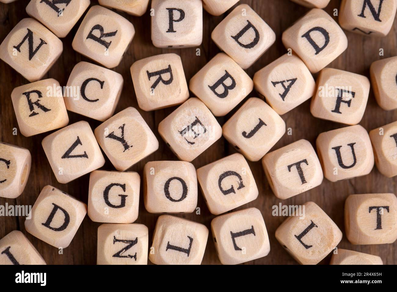 Random sorted wooden alphabet letters Stock Photo - Alamy