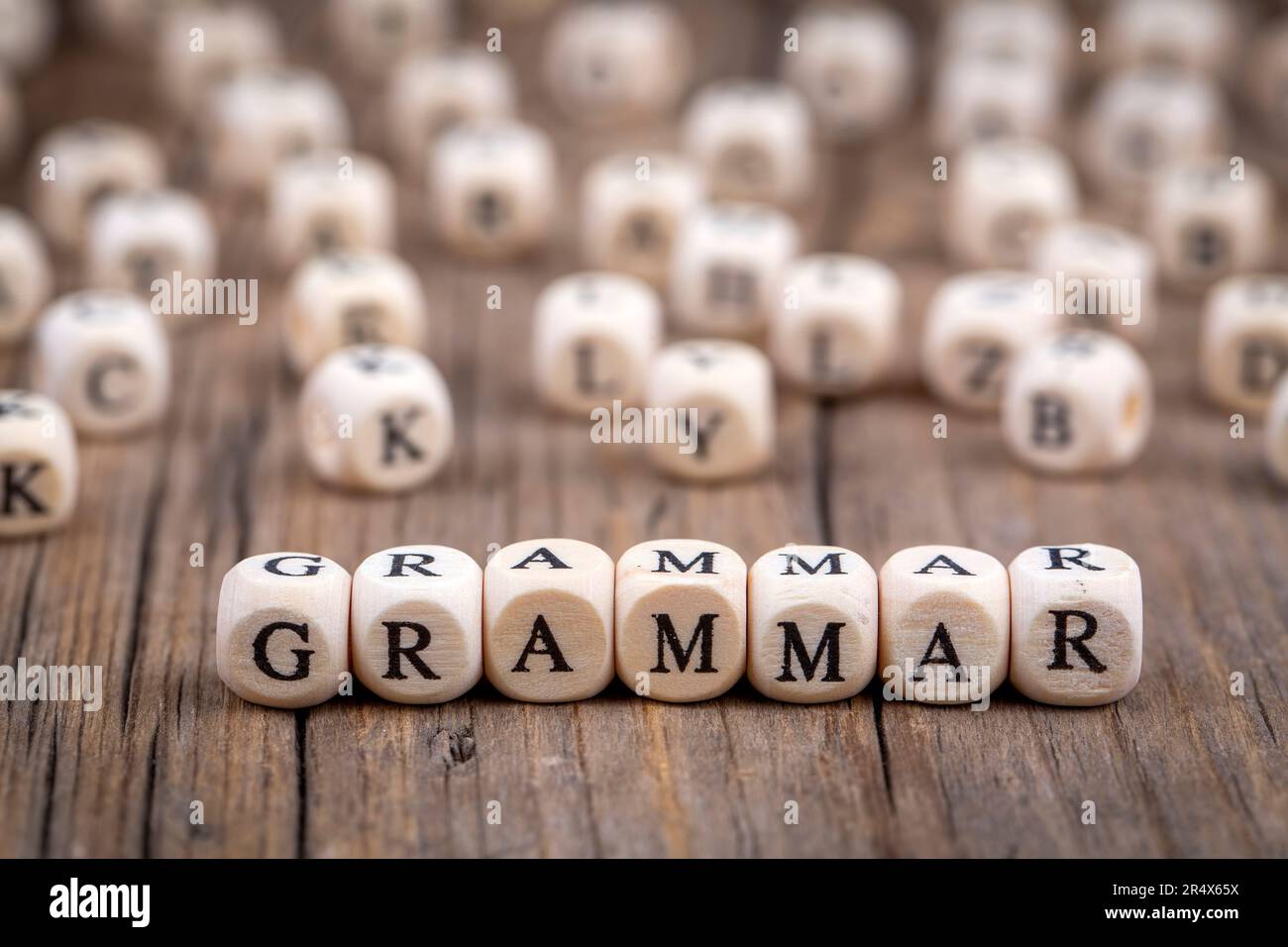 The word grammar wooden cubes with burnt letters, study of grammar of ...