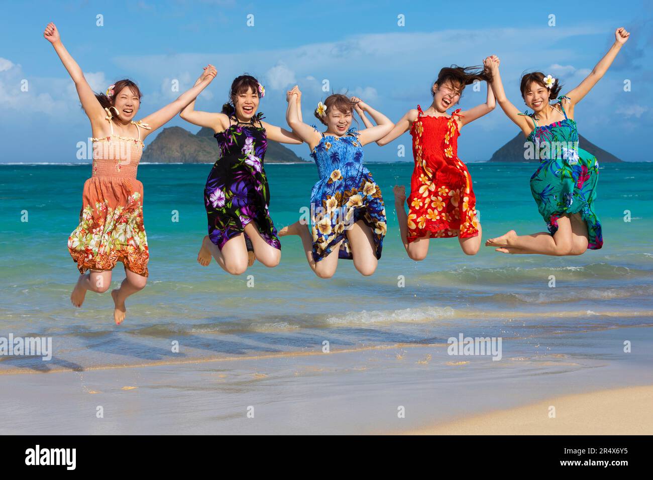 Group of Japanese students on vacation at Lanakai Beach with the Mokes ...