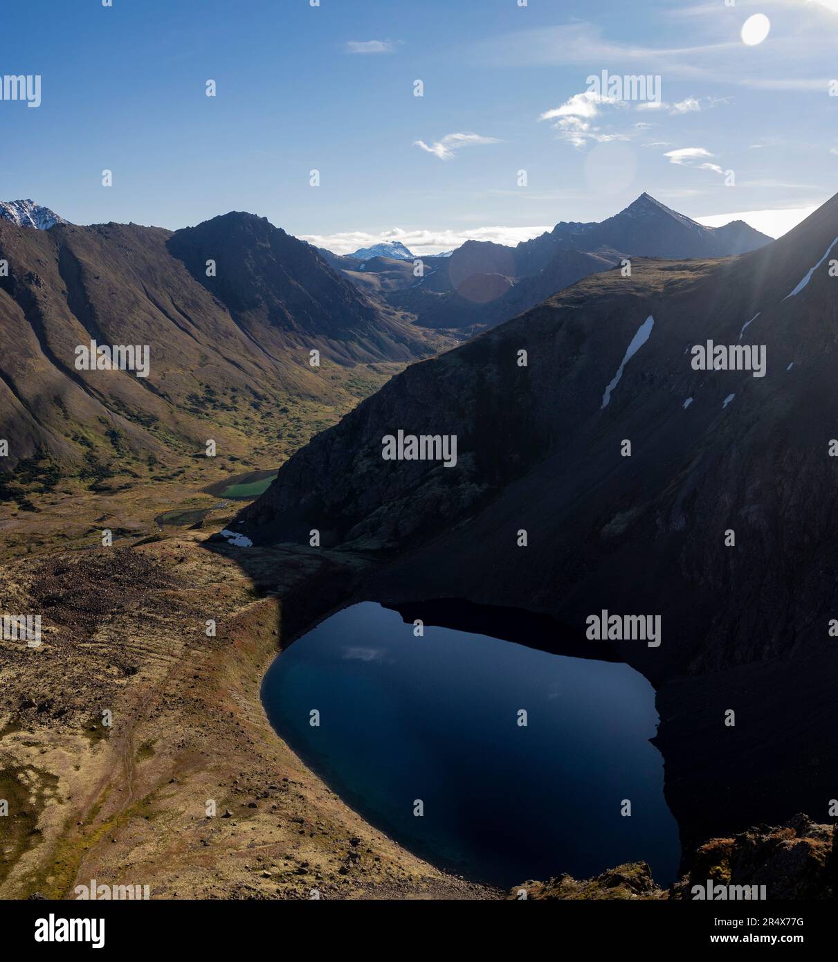 Stunning view of Deep Lake surrounded by the Chugach Mountains with ...