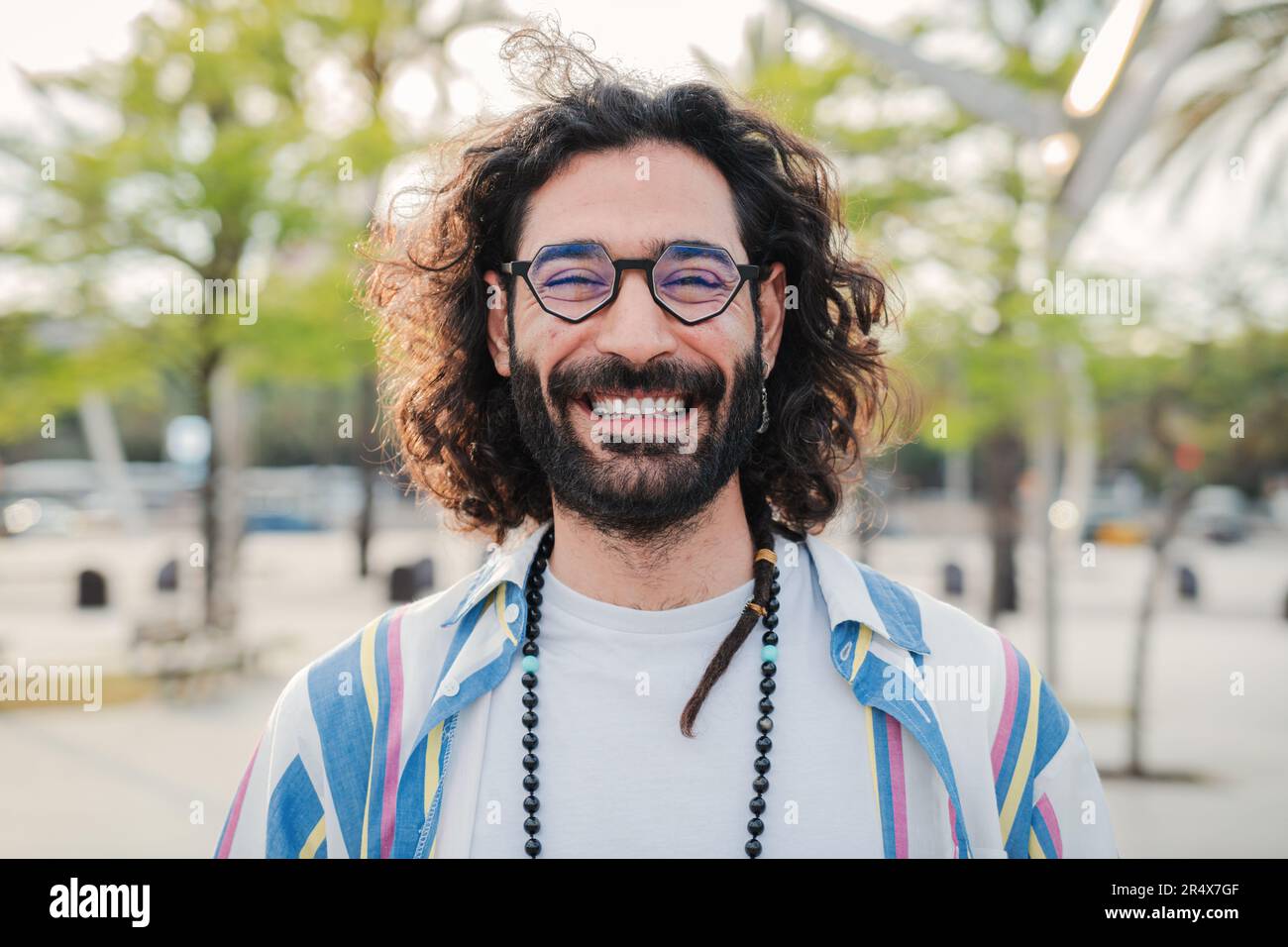 Portrait hippie man posing camera hi-res stock photography and images ...