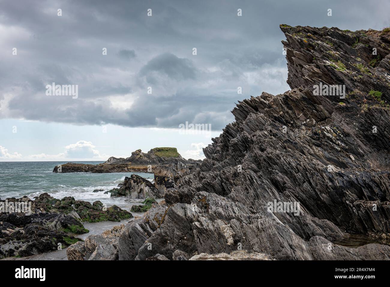 Close-up of jagged rock formations and rocky shoreline of the Atlantic ...