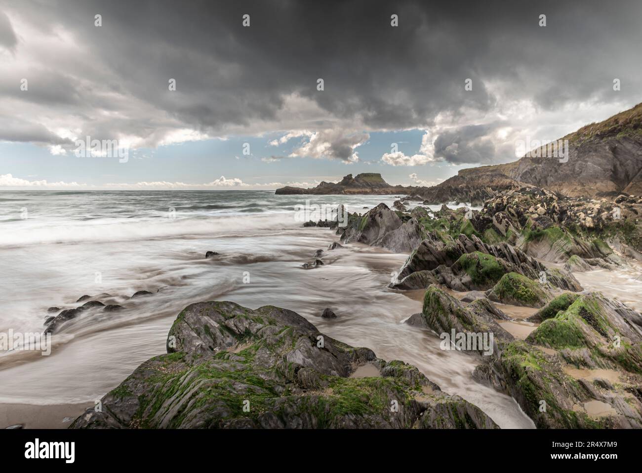 Long Exposure of waves coming in along the beach on Long Strand and the ...