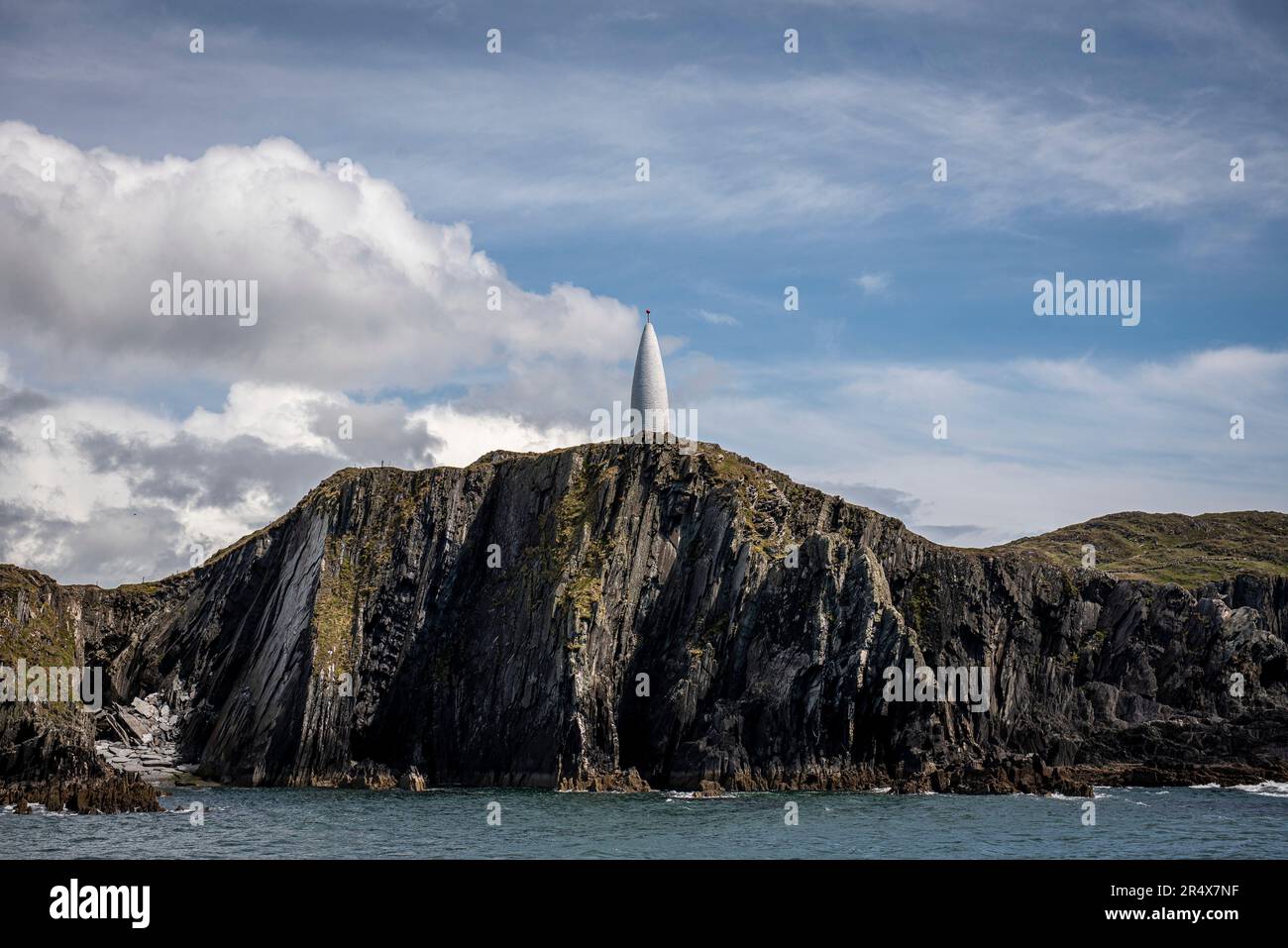 The white, conical Baltimore Beacon in the village of Baltimore on the ...