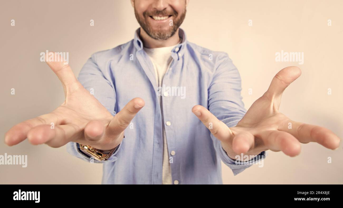 grabbing hands with grab gesture in studio. photo of grabbing hands ...