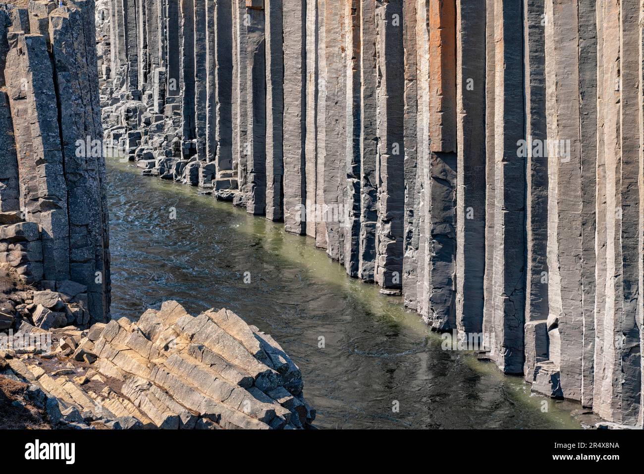 Close-up of the basalt columns of Stuðlagil Canyon in Northeastern Iceland, creating an amazing ...