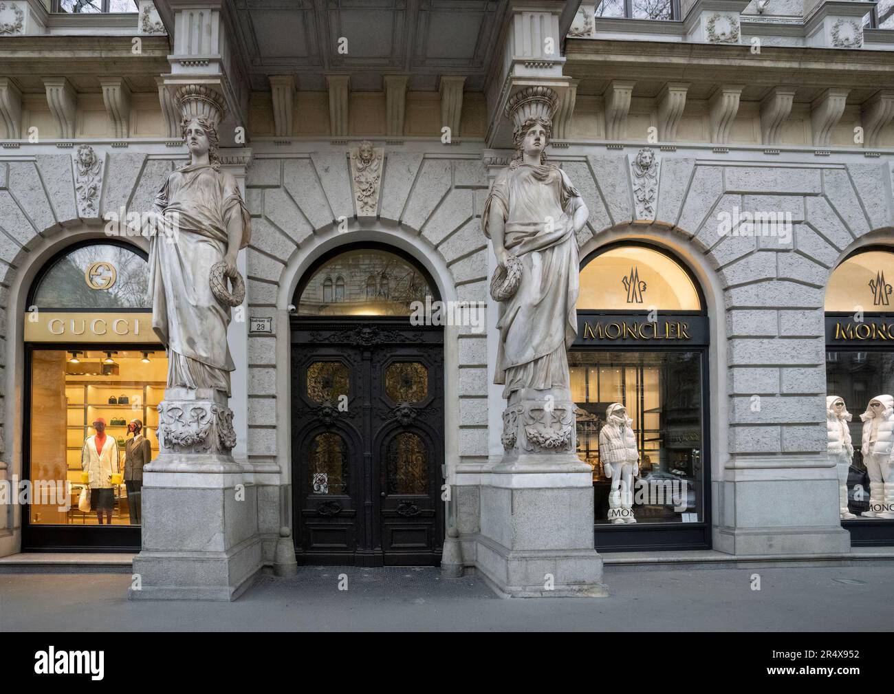 Budapest, Hungary - November 28th, 2022: Two statues and an ornate door ...