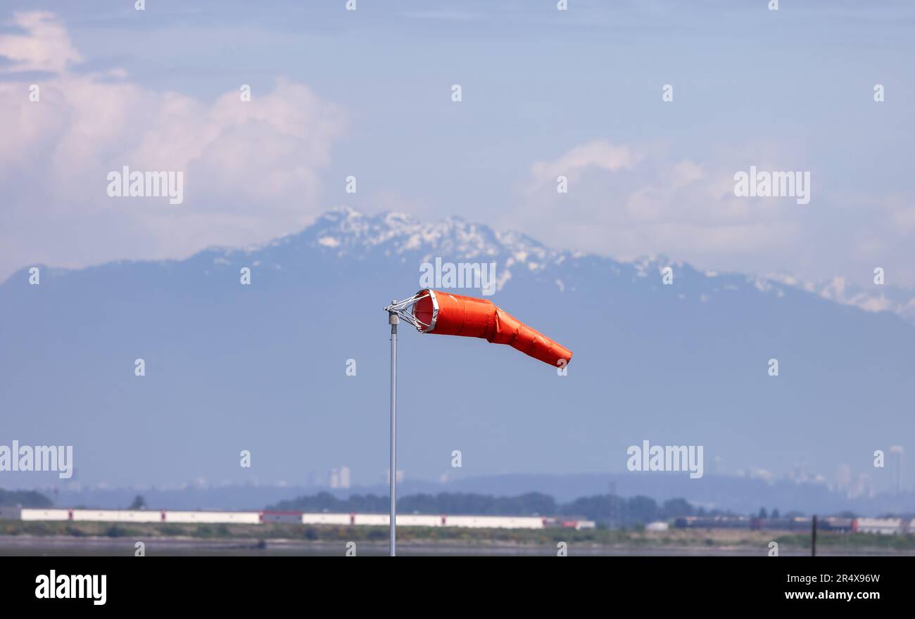 Wind Sock on the West Coast during windy day Stock Photo - Alamy