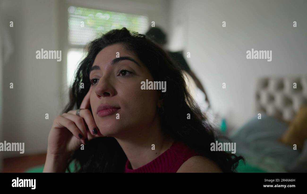 Couple in crisis Young woman rolling eyes listening to male partner ...