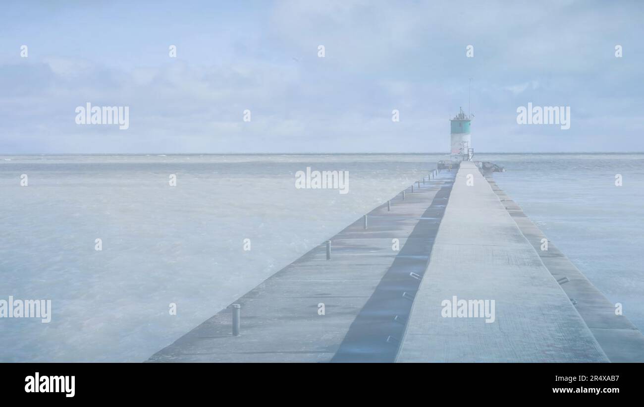 long empty pier to lighthouse at the end of breaker for graphic ...