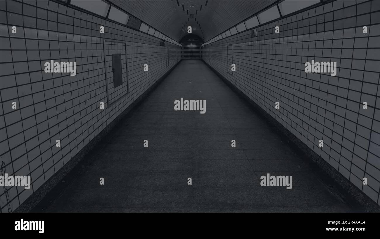 Long empty hallway to underground subway station for graphic resources ...