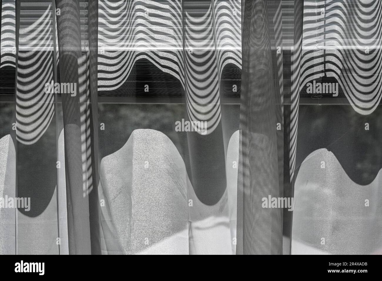 Abstract pattern formed by window shades and sheer curtain Stock Photo ...