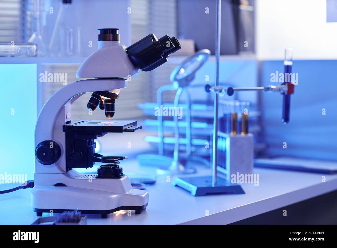 Side view closeup of electronic microscope on laboratory workstation in ...