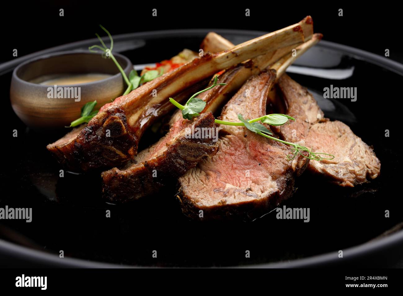grilled ribs with vegetable salad and sauce Stock Photo - Alamy