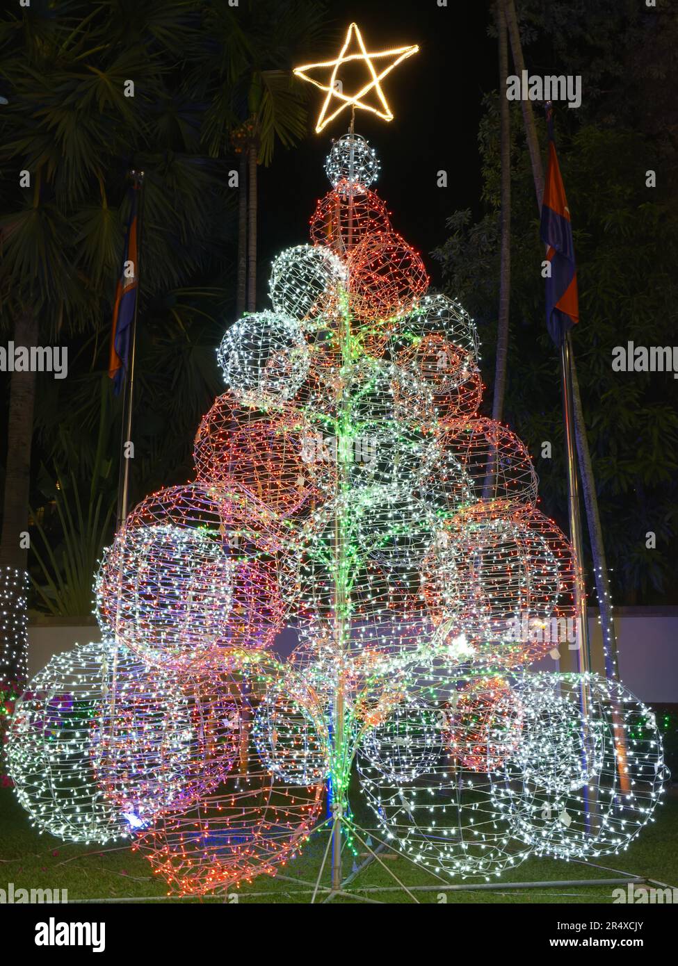 Colorful glowing street decorations dedicated to Christmas in Cambodia ...