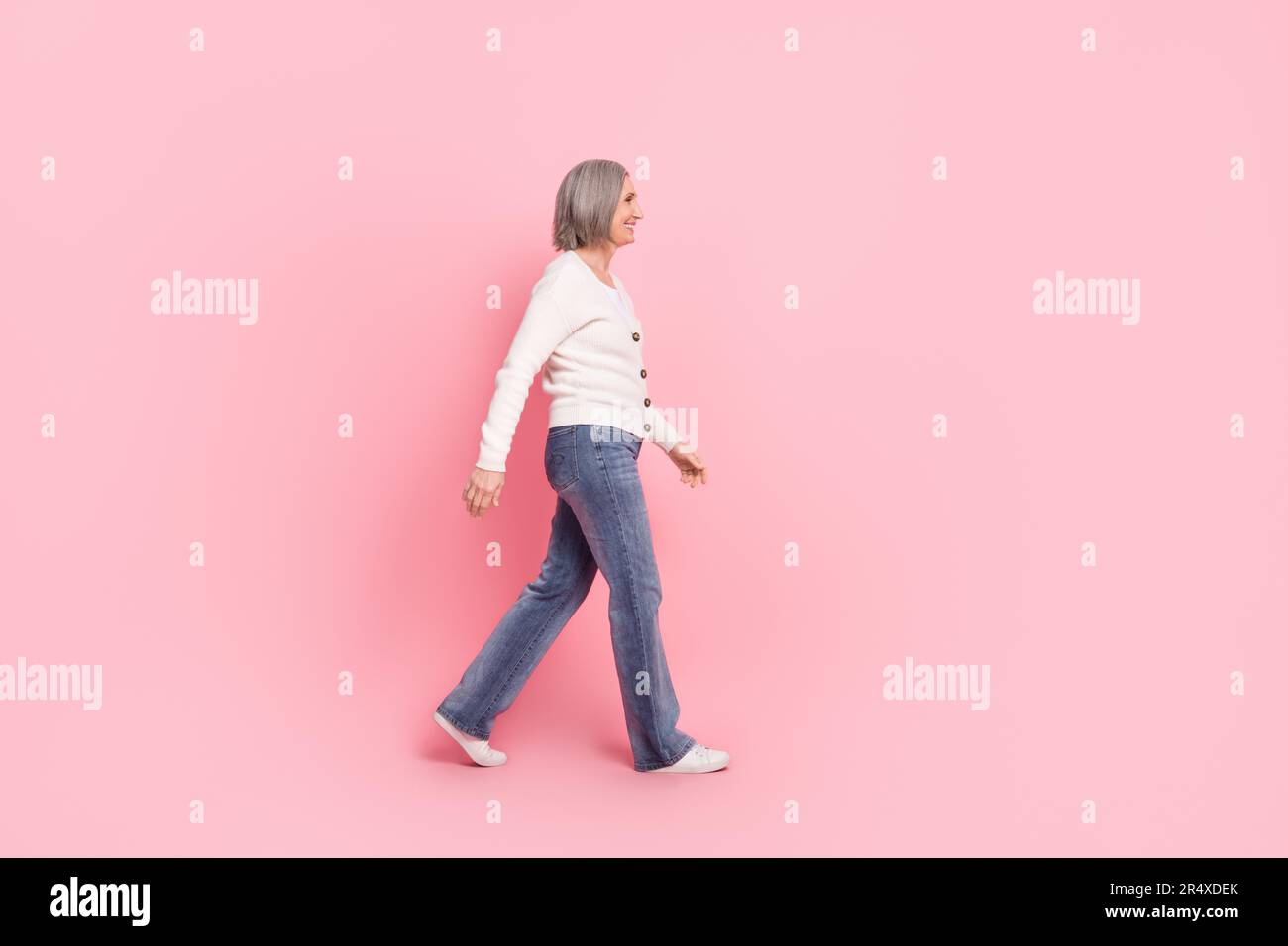 Full body profile portrait of pretty positive person good mood walking ... Full body profile portrait of pretty positive person good mood walking ...