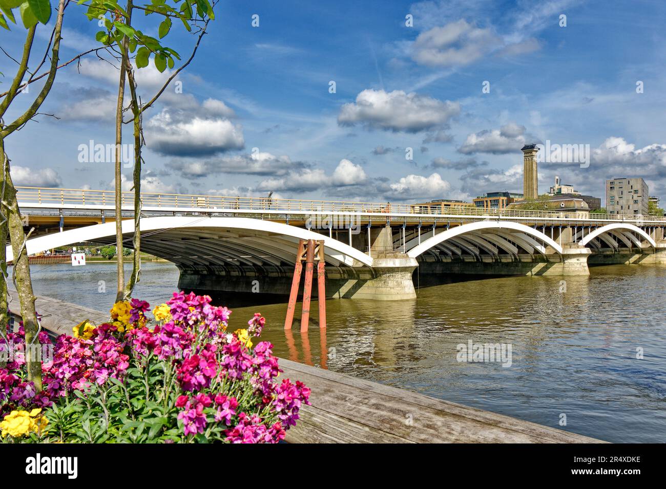 London Wandsworth Battersea a blue sky over the River Thames and ...