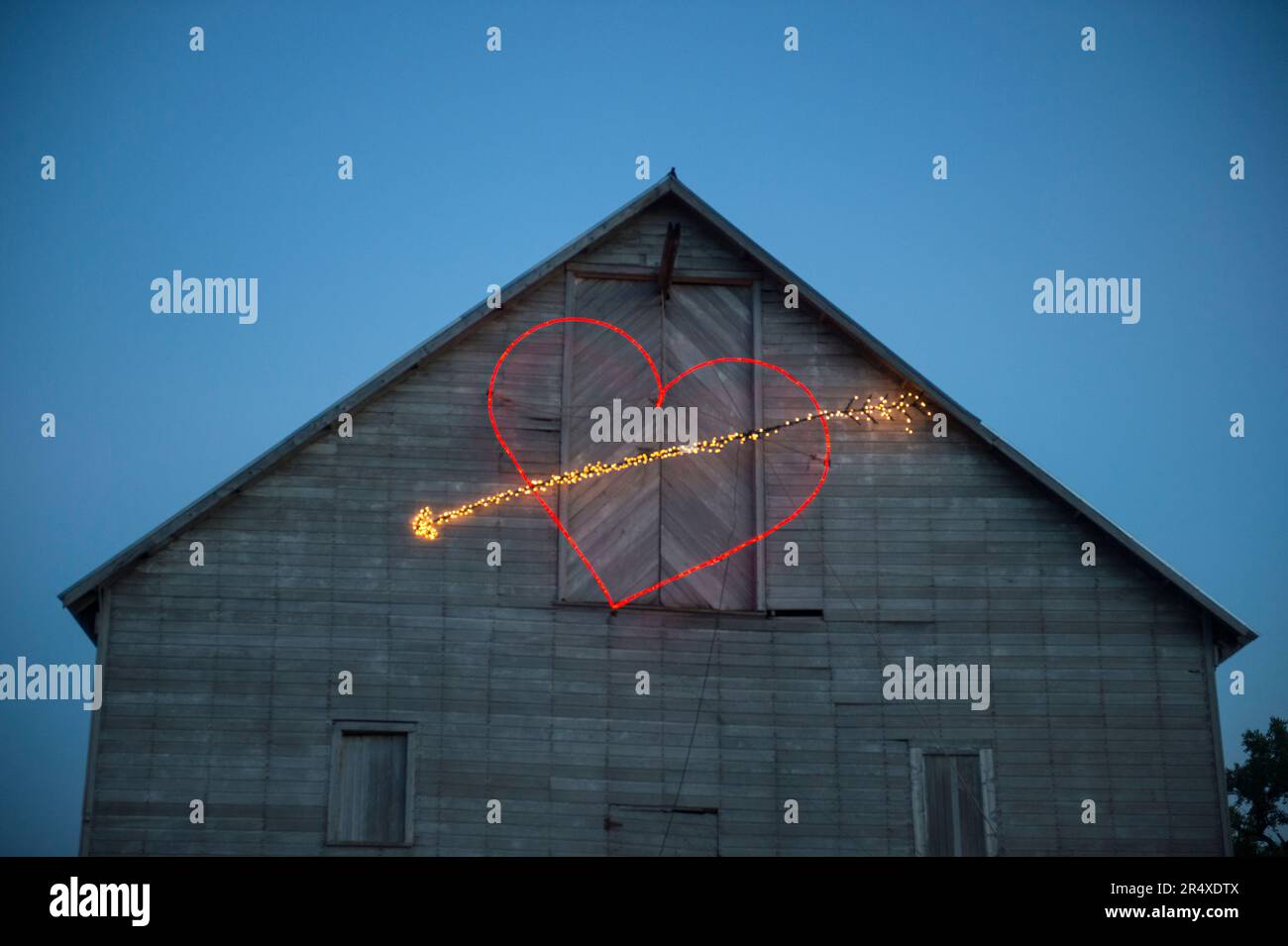 Heart shape made from light trail on a barn; Genoa, Nebraska, United ...