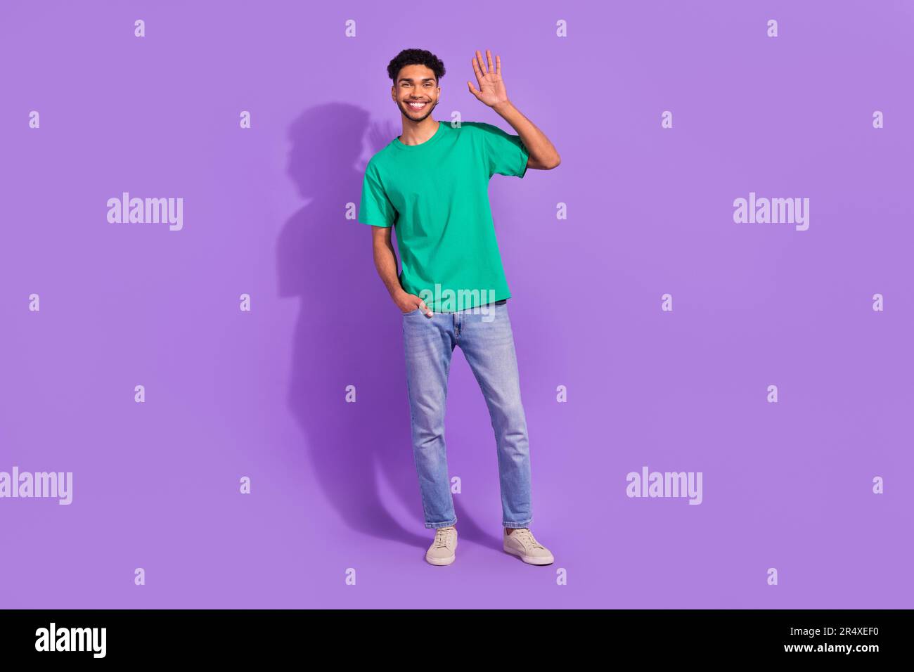 Full size portrait of satisfied glad nice person arm palm waving hello ...