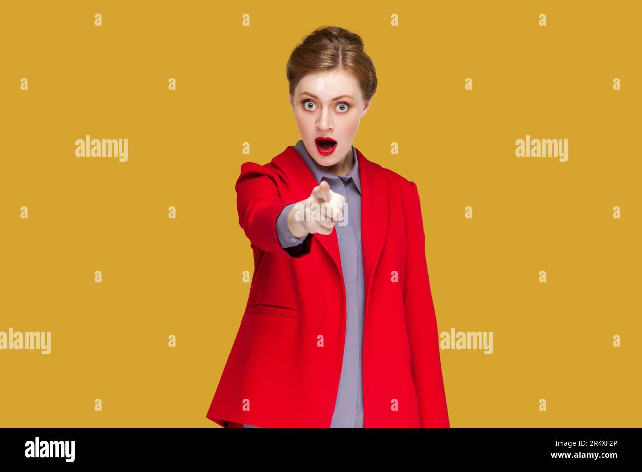 Portrait of shocked astonished woman with red lips standing indicating ...