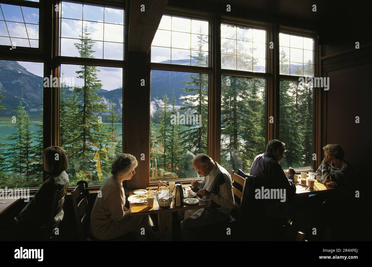 Guests enjoy a meal in the lodge dining room in Yoho National Park, BC ...
