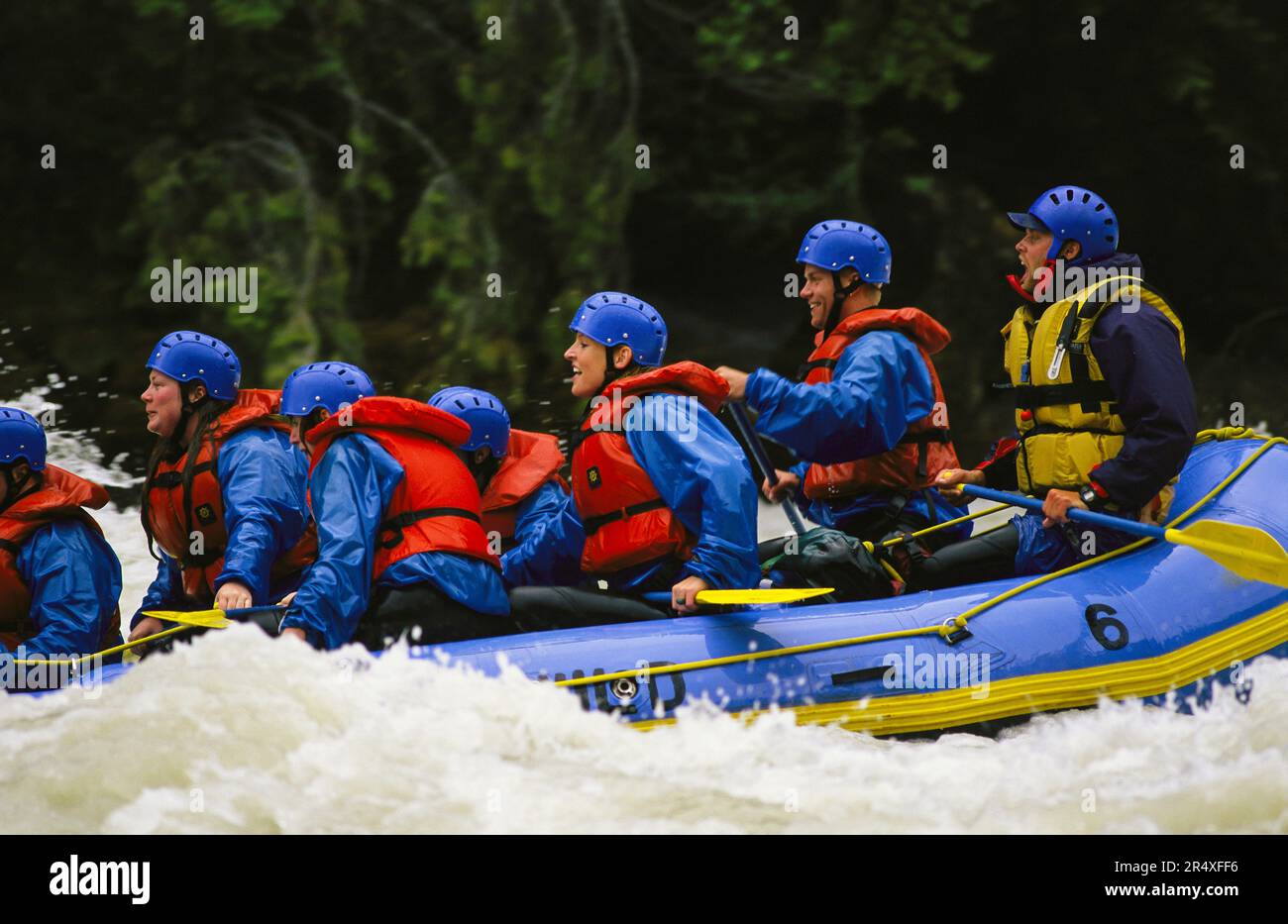 Raft trip down the rapids of the Kicking Horse River in Yoho National Park, BC, Canada; British ...