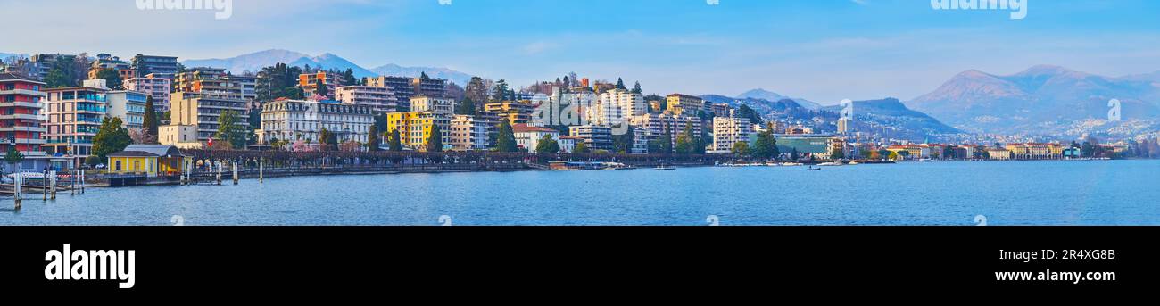 Panorama of Lugano embankment with hotels, modern houses, vintage ...