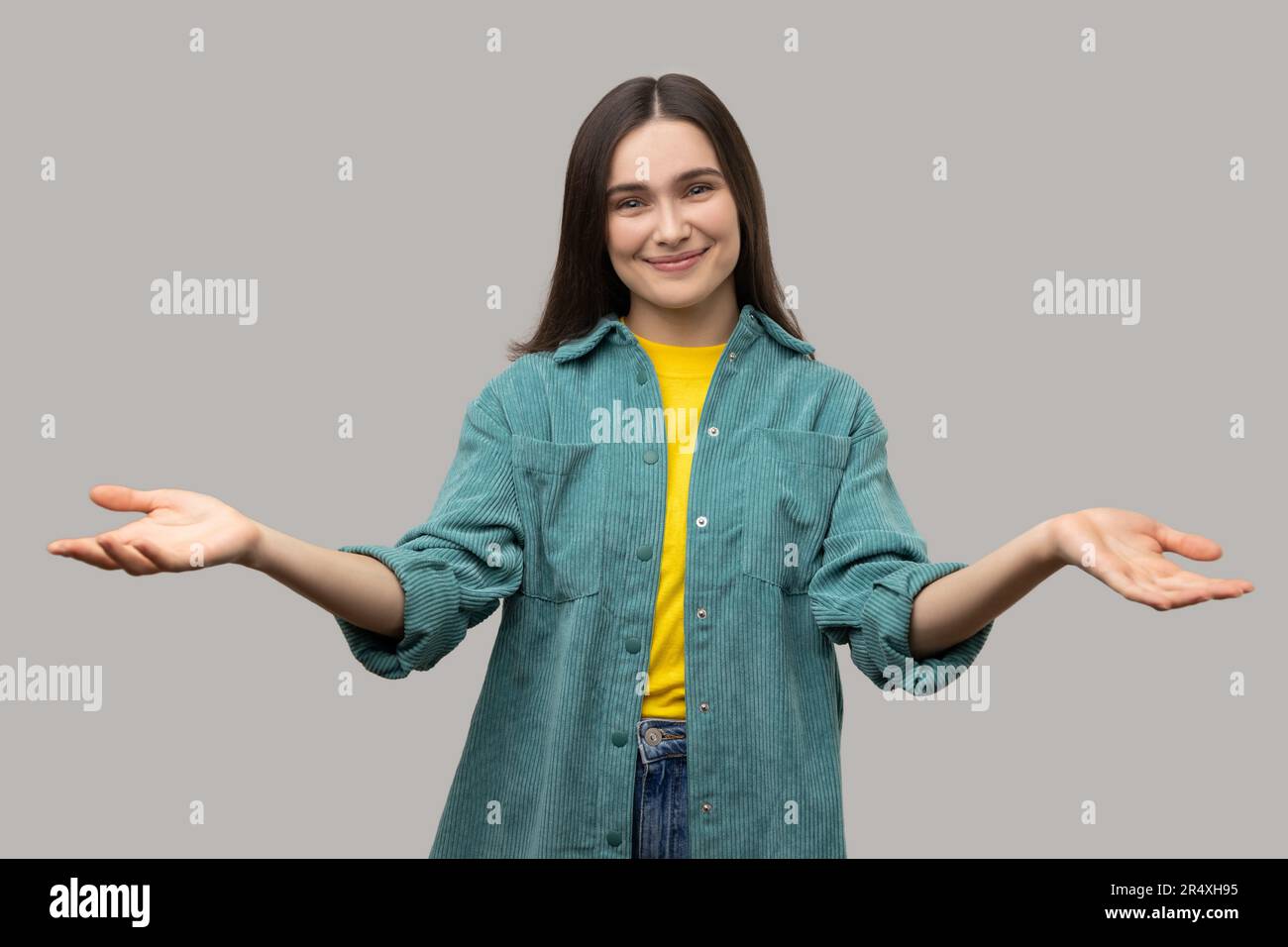 Wide open hug. Nice to meet you. Generous woman standing with wide ...