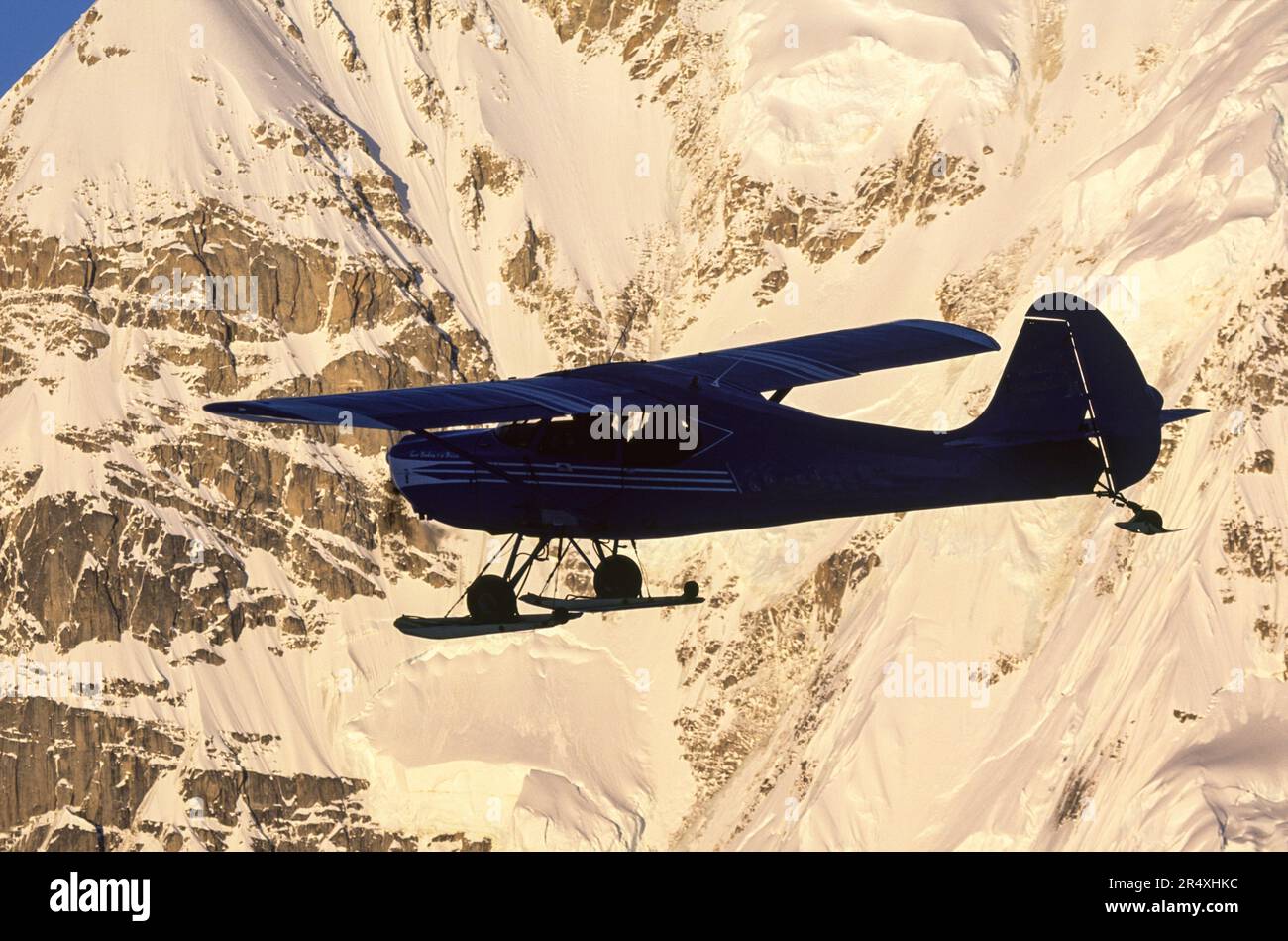 Ski plane from Talkeetna flies past Mount Denali, Denali National Park ...