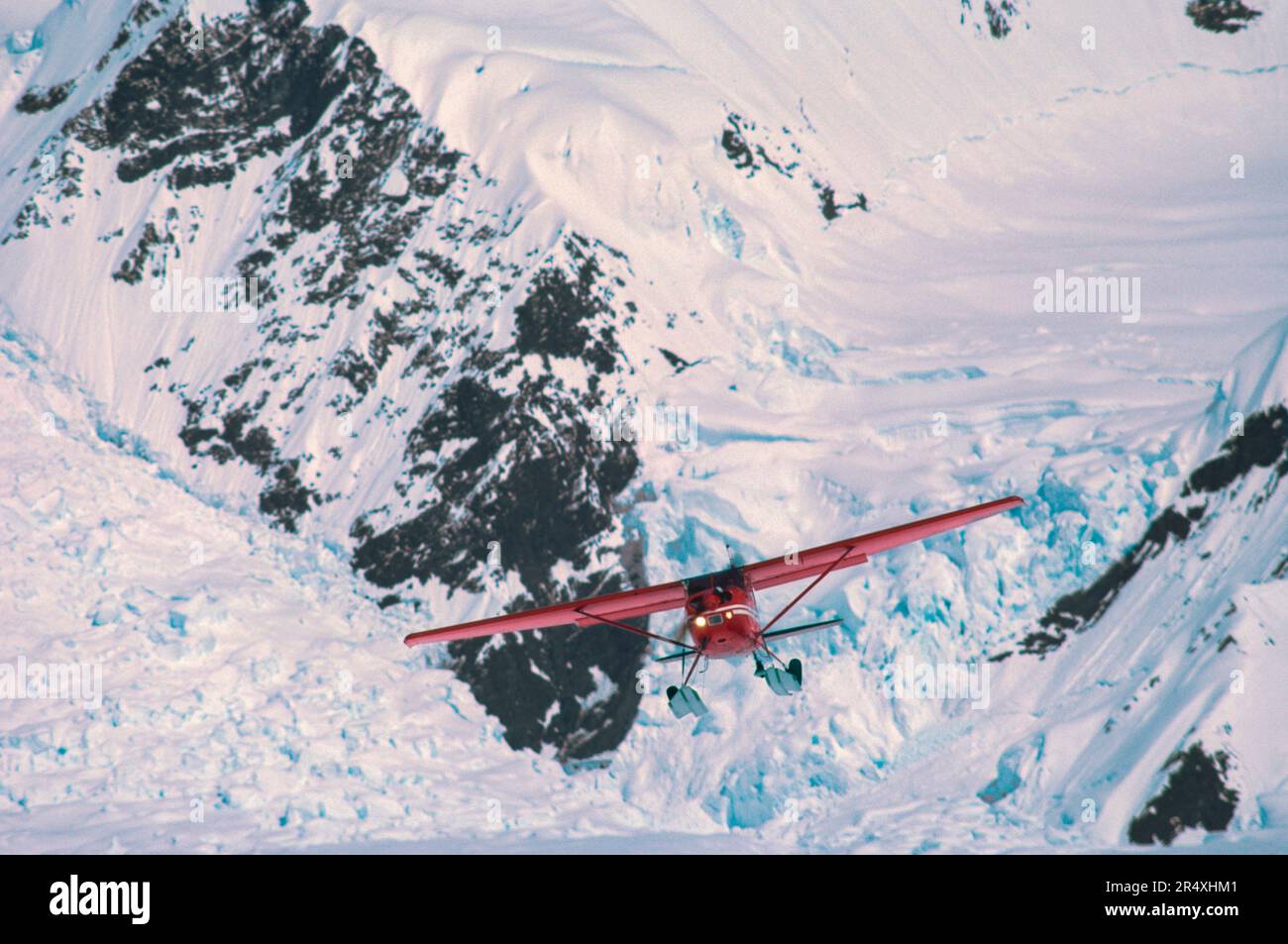 Ski plane flies above Ruth Glacier in Denali National Park and Preserve ...