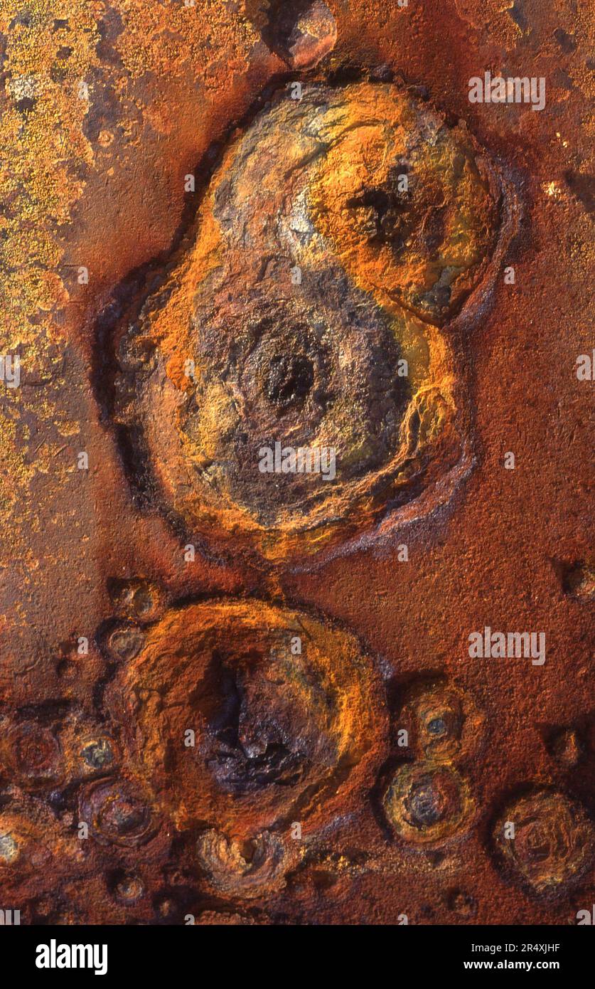 Bright vivid colours created by the rusting of the old steel plates of ...