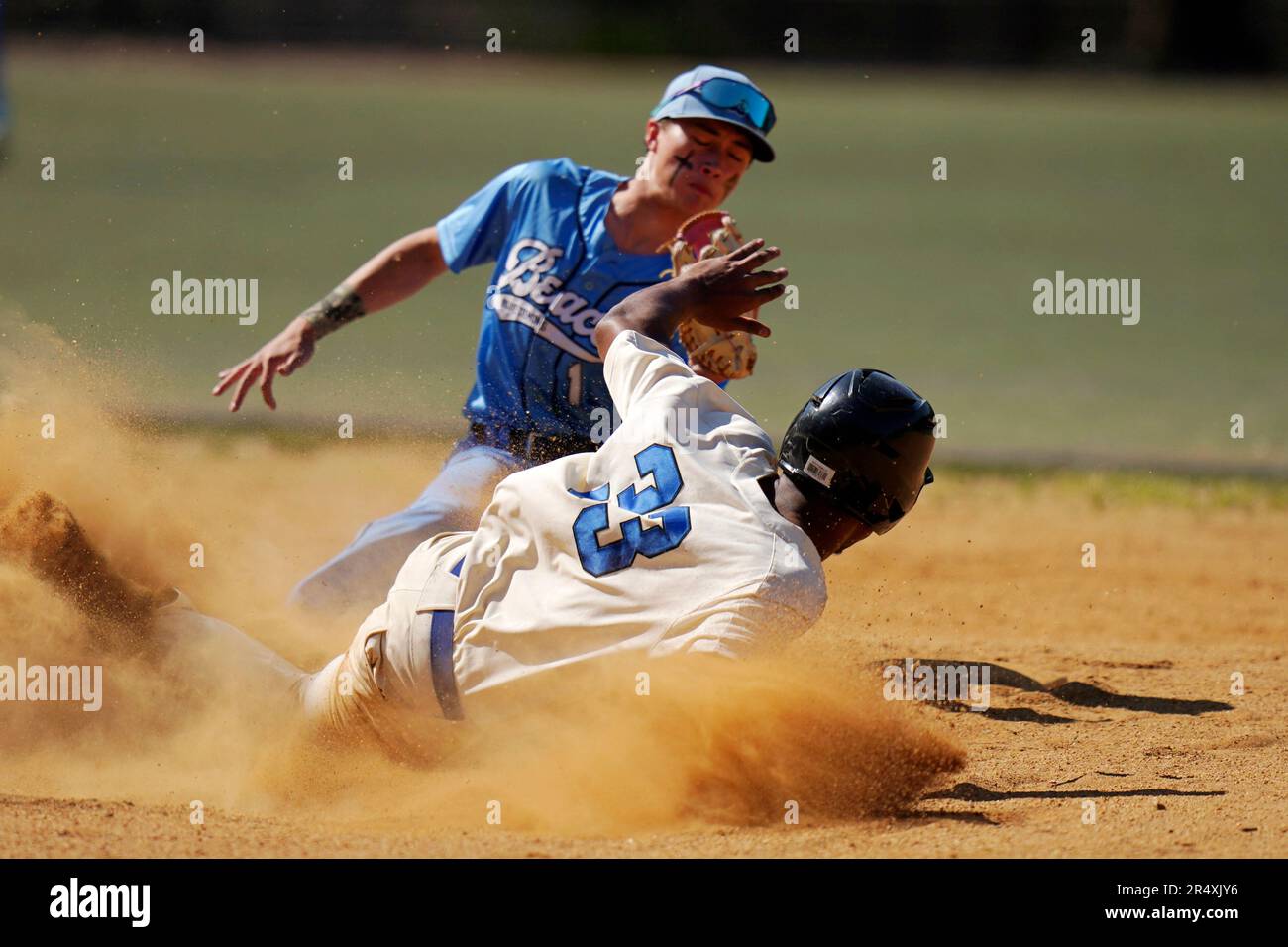 John Jay's Carlos Moreno Almanzar (33) slides into second against ...