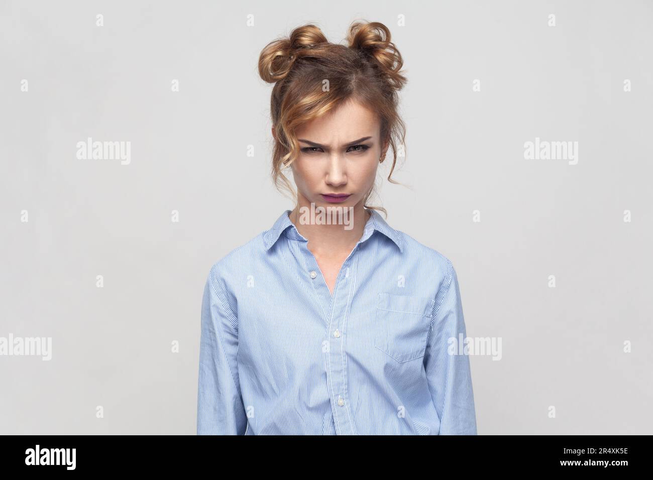 Portrait of annoyed irritated angry blonde woman feeling anxious and ...