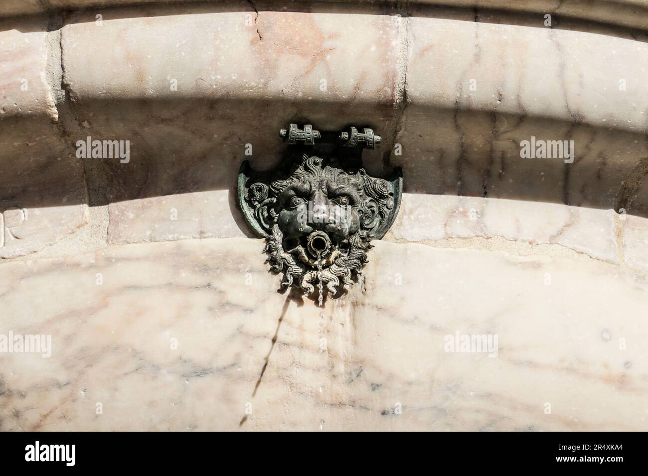 Beautiful Mythological water fountain face in Evora Town, Portugal ...