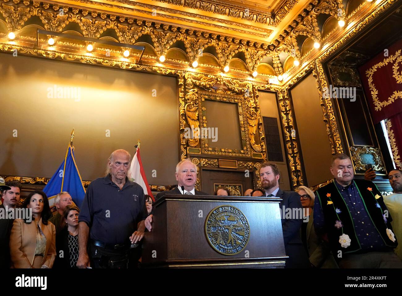 Minnesota Gov. Tim Walz speaks to the media after signing a bill to ...