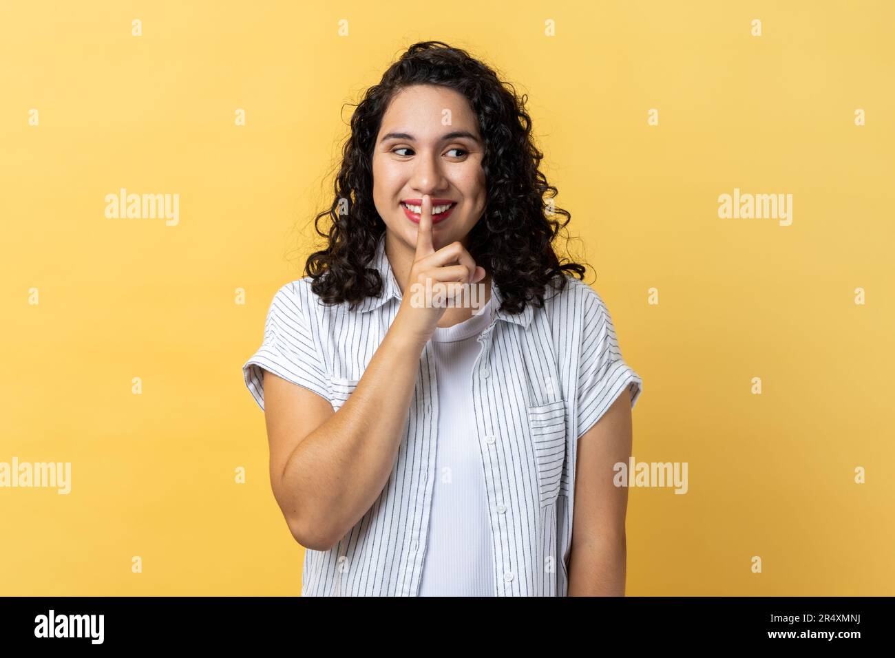 Asian woman shushing hi-res stock photography and images - Alamy
