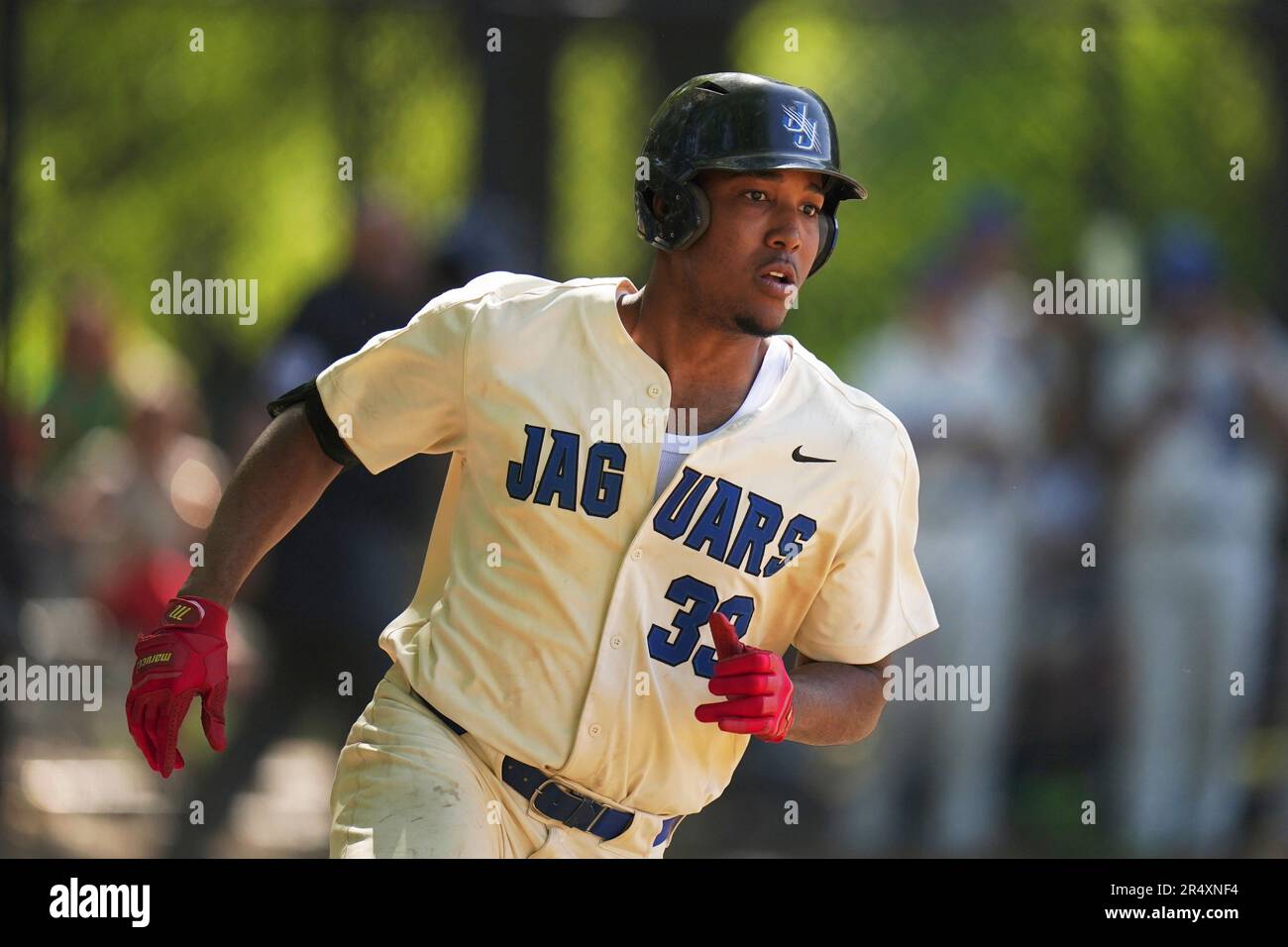 John Jay's Carlos Moreno Almanzar (33) runs to first during a PSAL AAA ...